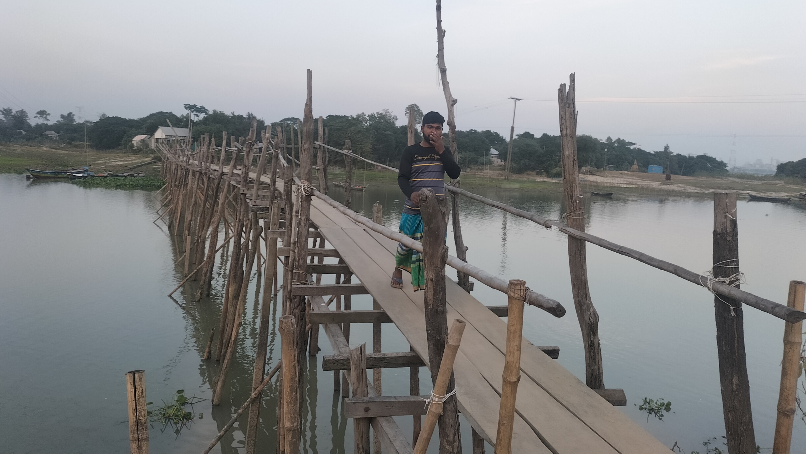 Risky wooden bridge; The bridge is not built yet